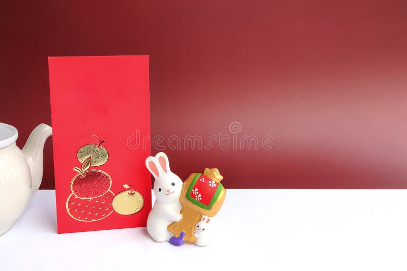 Figure of White Rabbit and Red Envelopes on Red Background with Blank ...