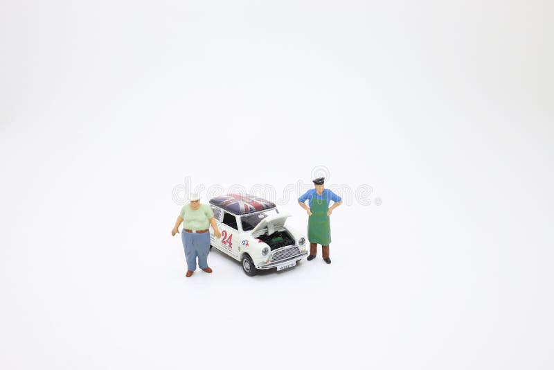 The Scale of Mini Cooper with Figure Editorial Stock Image - Image of ...