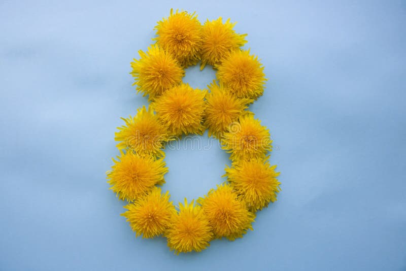 Figure 8 of Yellow Dandelion Flowers on a Blue Background. the Concept ...