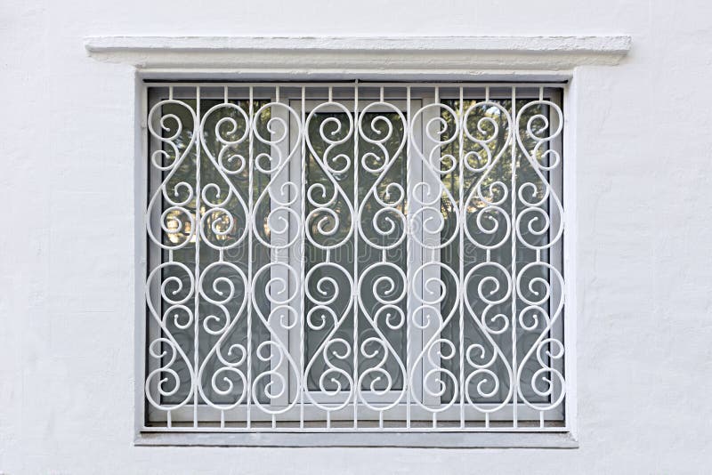 Figured Frame of the Window with Iron Forged White Grating Stock Photo ...