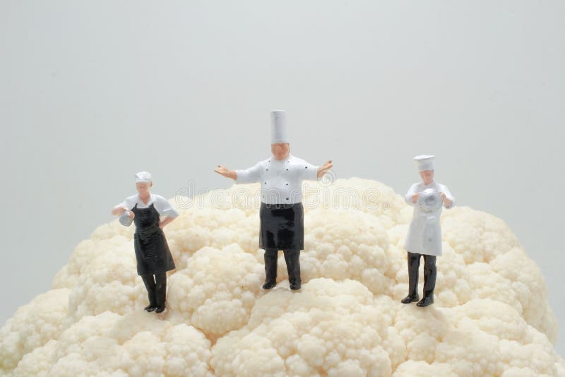 Figures of Chef on Whole Cauliflower Vegetable Stock Photo - Image of ...