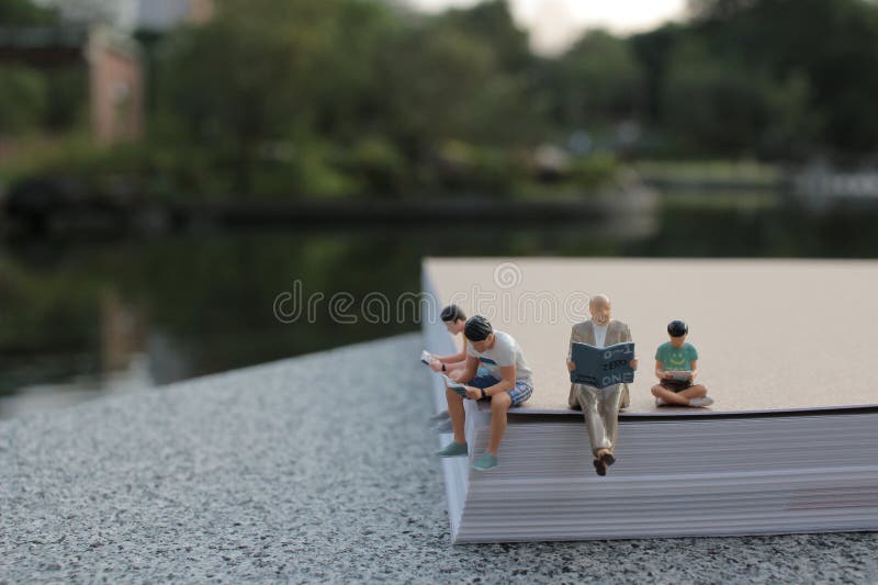 Figures Reading and Relaxing on a Giant Book Stock Image - Image of ...
