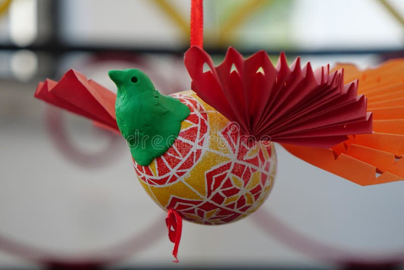 Figurine of Bird Made of Plasticine, Paper and Painted Easter Egg Hangs ...
