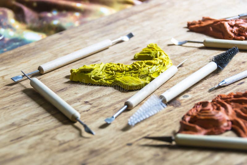 Figurine Clay Plasticine in a Workshop with Tools on a Wooden Ba Stock ...