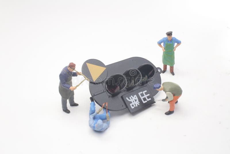 A Figurine Engineer Worker HelpTraffic Light Stock Image - Image of ...