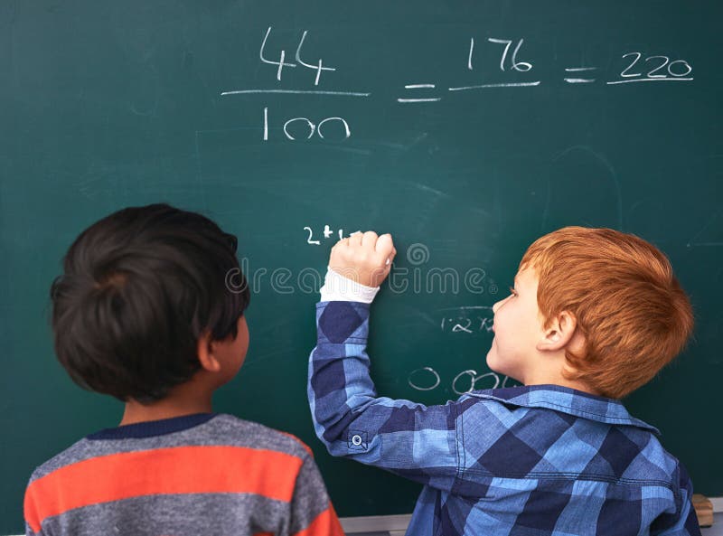 Figuring it Out Together. Elementary School Children in Class. Stock ...