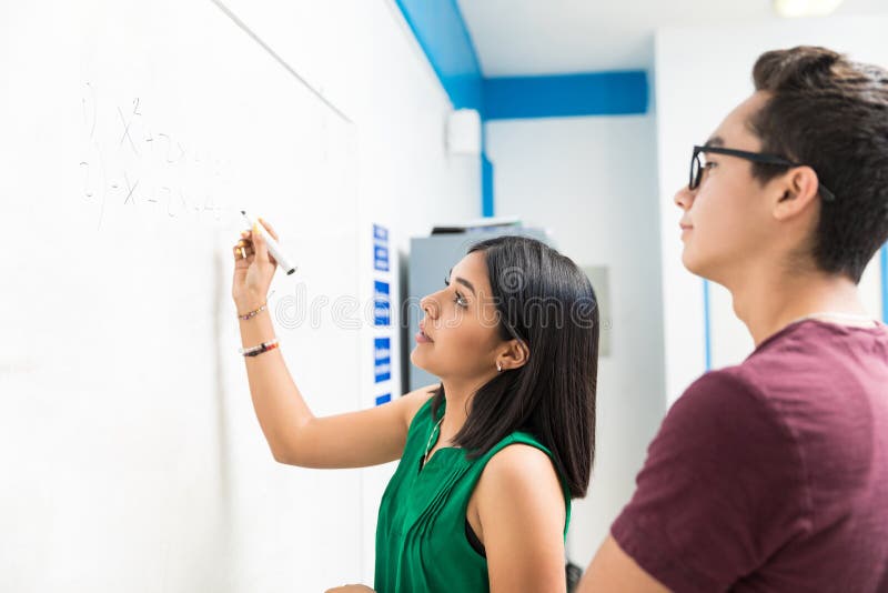 Figuring it Out Together stock photo. Image of girl - 149309302