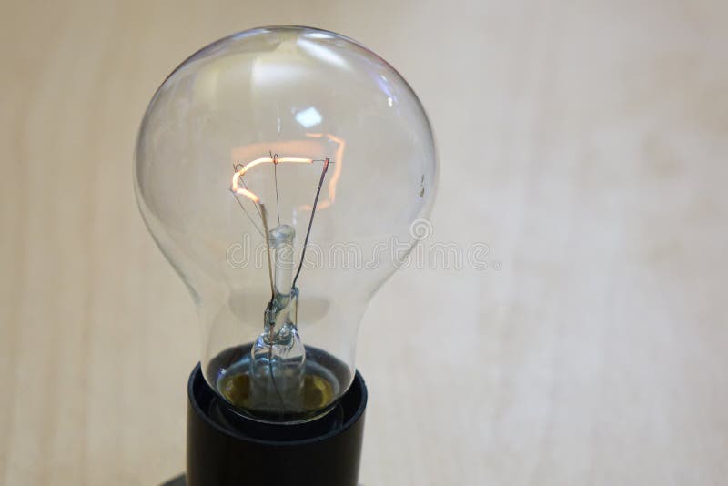 The filament in the lamp. stock photo. Image of energy - 113967020