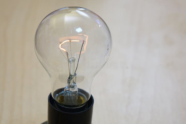 The filament in the lamp. stock photo. Image of energy - 113967020