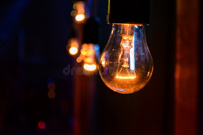 The filament in the lamp. stock image. Image of black - 113967027
