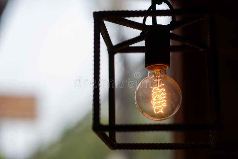 The filament in the lamp. stock image. Image of black - 113967027