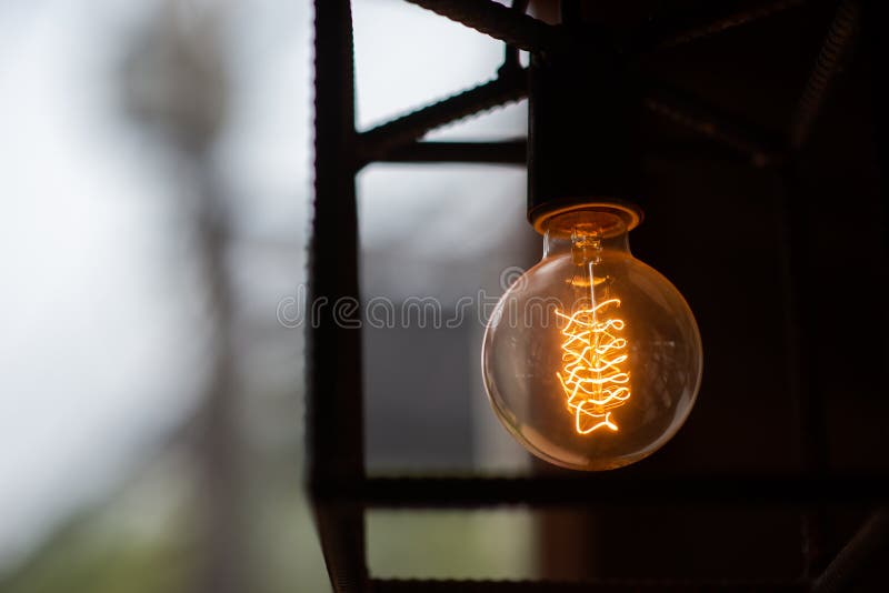 The filament in the lamp. stock photo. Image of energy - 113967020