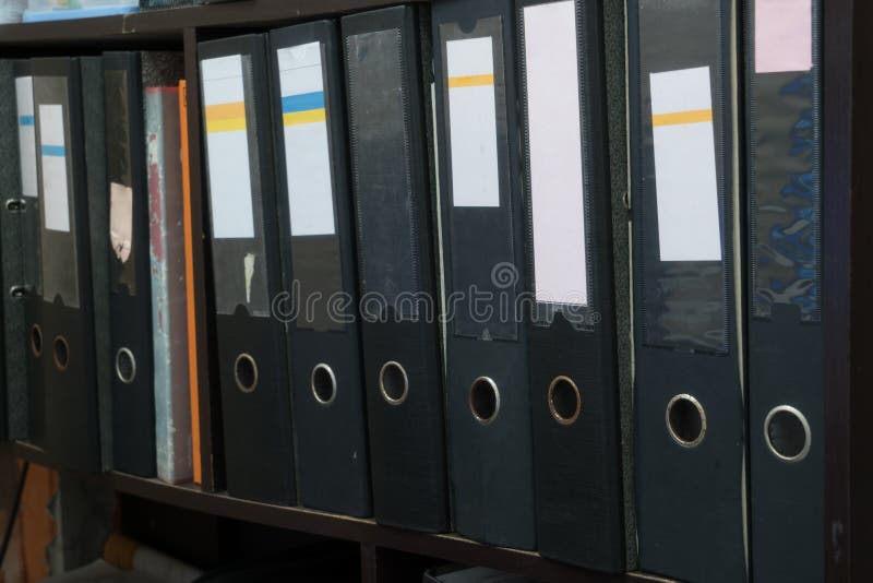 File Archive on Wooden Floor Stock Image - Image of folder, card: 83856877