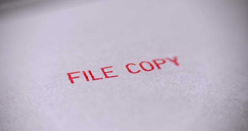 A Stamp FILE COPY is Placed on a Sheet of White Paper, Close-up Stock ...