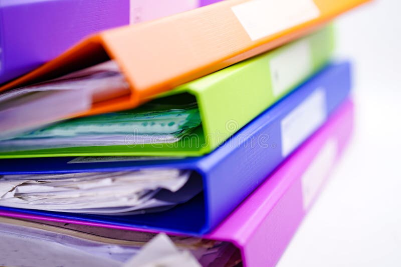 File Folder Binder Stack of Multi Color on Table in Office. Stock Image ...
