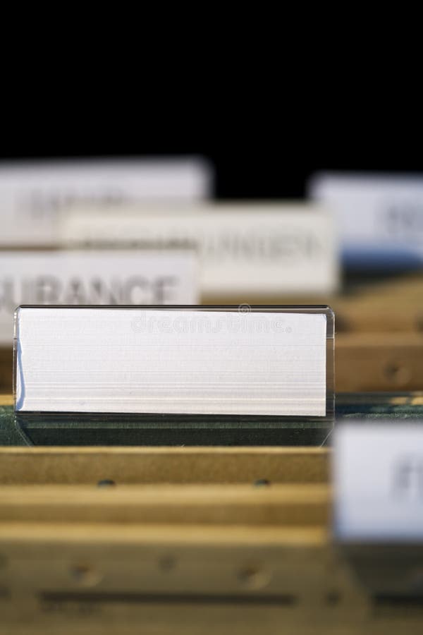 File Folder with Blank Label in Filing Cabinet Stock Photo - Image of ...