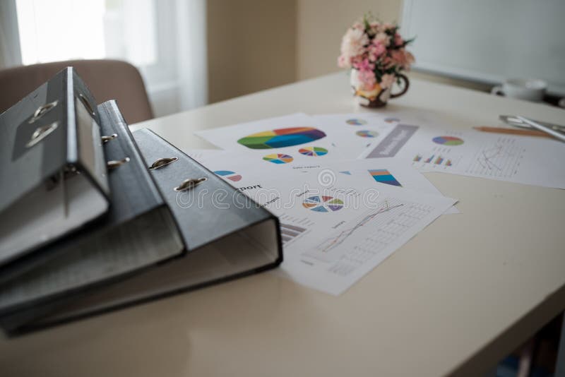 File Folder with Documents on the Desk Related To Business Functions ...