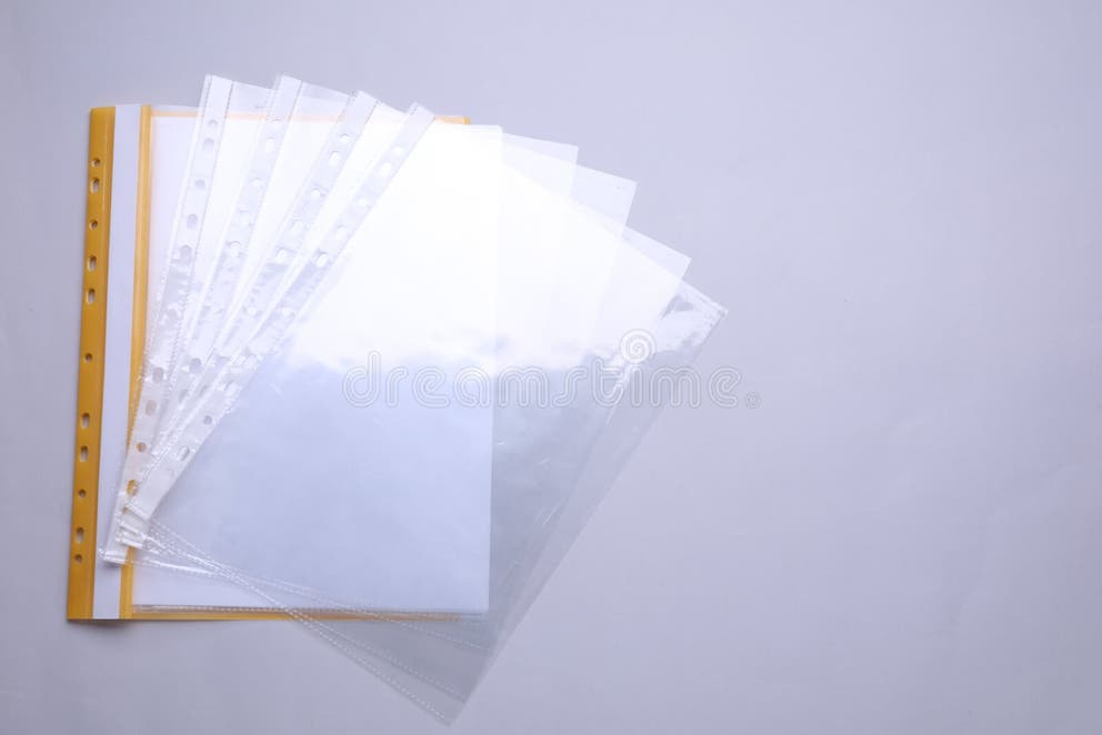 File Folder with Punched Pockets and Paper Sheets on Light Grey ...