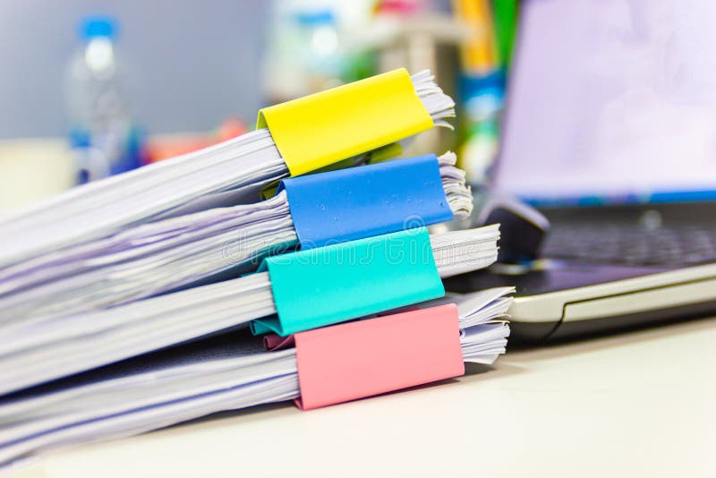 File Folder and Stack of Business Report Paper File on the Table Stock ...
