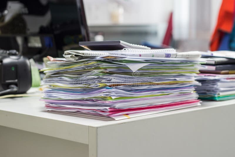 File Folder and Stack of Business Report Paper File on the Table Stock ...