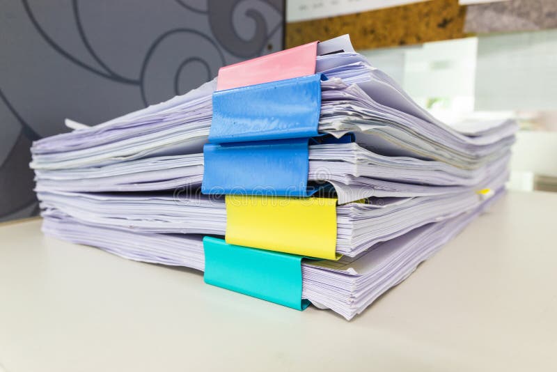 File Folder And Stack Of Business Report Paper File On The Table In A ...