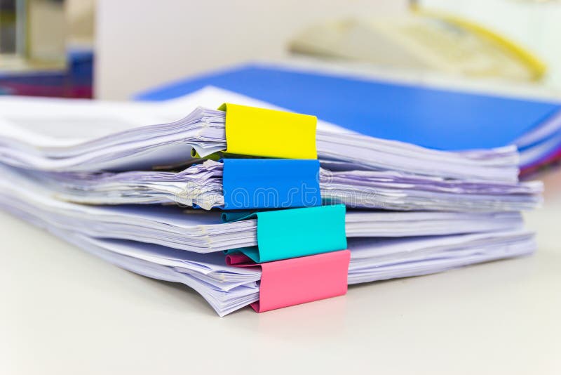 File Folder and Stack of Business Report Paper File on the Table Stock ...