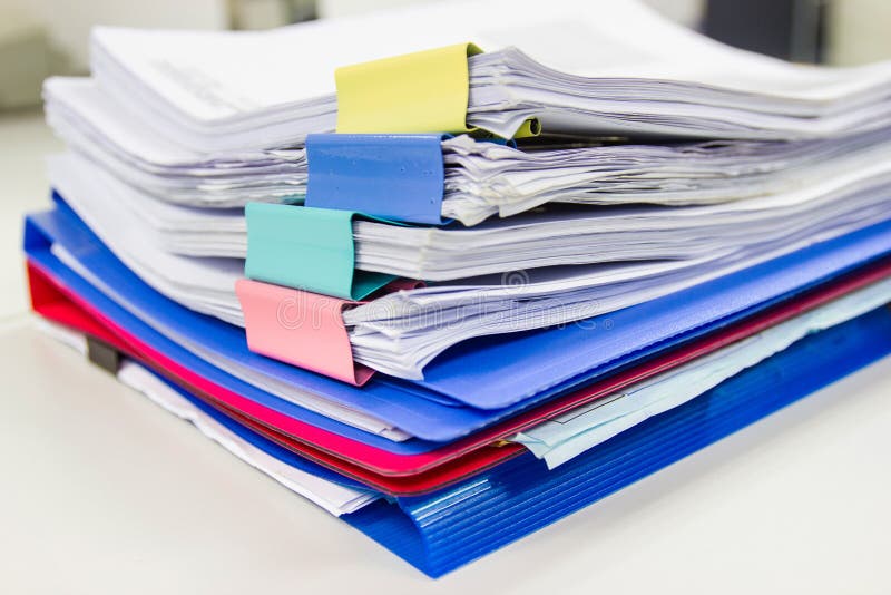 File Folder and Stack of Business Report Paper File on the Table Stock ...