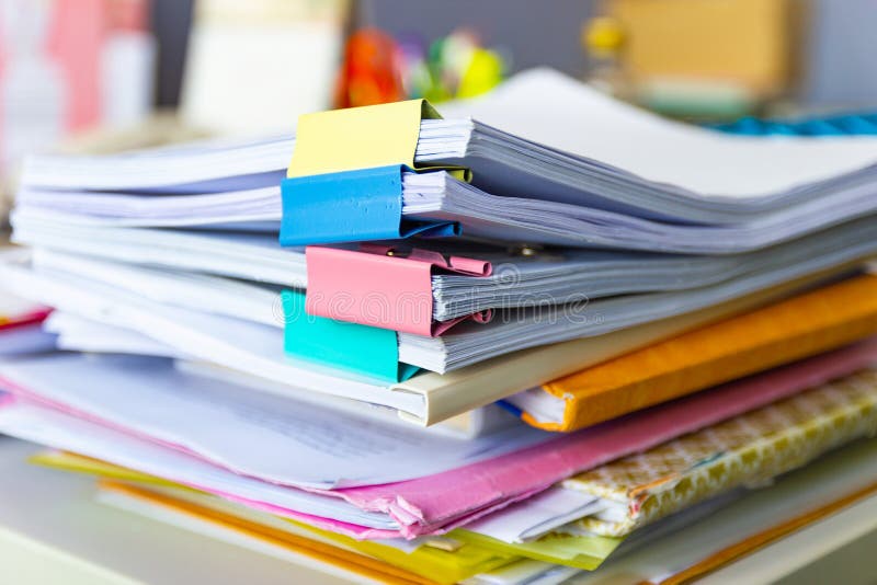 File Folder and Stack of Business Report Paper File on the Table Stock ...