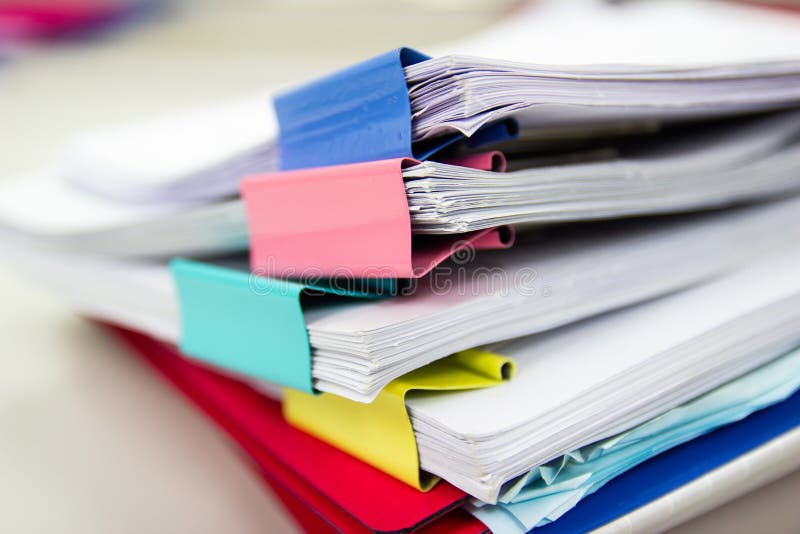 File Folder and Stack of Business Report Paper File on the Table Stock ...