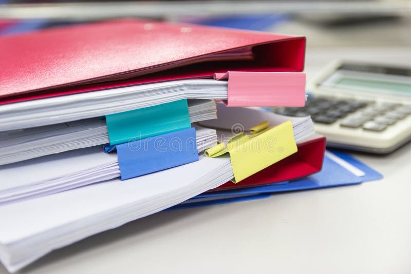 File Folder and Stack of Business Report Paper File on the Table Stock ...