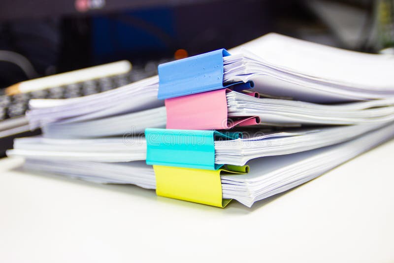 File Folder and Stack of Business Report Paper File on the Table Stock ...