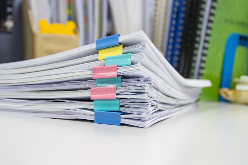 File Folder and Stack of Business Report Paper File on the Table Stock ...