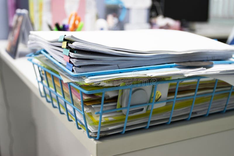 File Folder and Stack of Business Report Paper File on the Table Stock ...