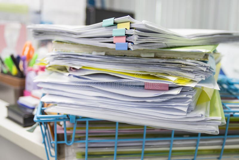 File Folder and Stack of Business Report Paper File on the Table Stock ...