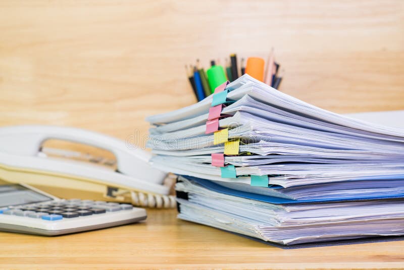 File Folder and Stack of Business Report Paper File on the Table Stock ...