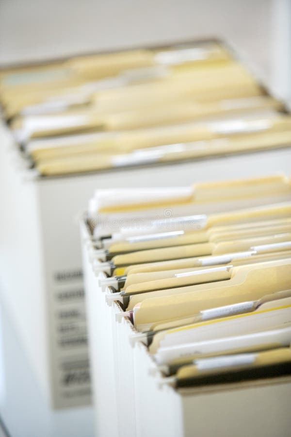 Rows of File Folders Arranged on Shelf with Client Data in Office ...
