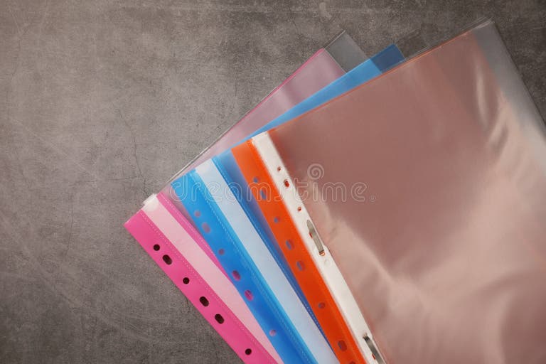 File Folders with Punched Pockets on Grey Table. Space for Text Stock ...