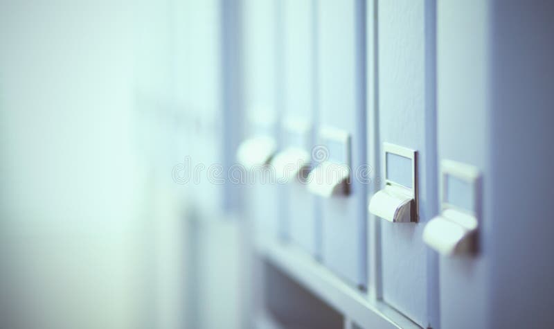 File Folders, Standing on Shelves in the Background Stock Photo - Image ...