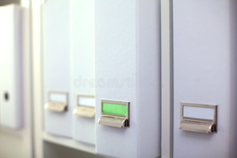 File Folders, Standing on Shelves in the Stock Photo - Image of blank ...