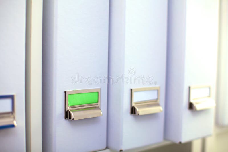 File Folders, Standing on Shelves in the Background Stock Image - Image ... File Folders, Standing on Shelves in the Background Stock Image - Image ...