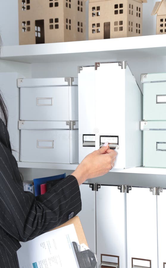 File Folders, Standing on Shelves in the Background Stock Photo - Image ...