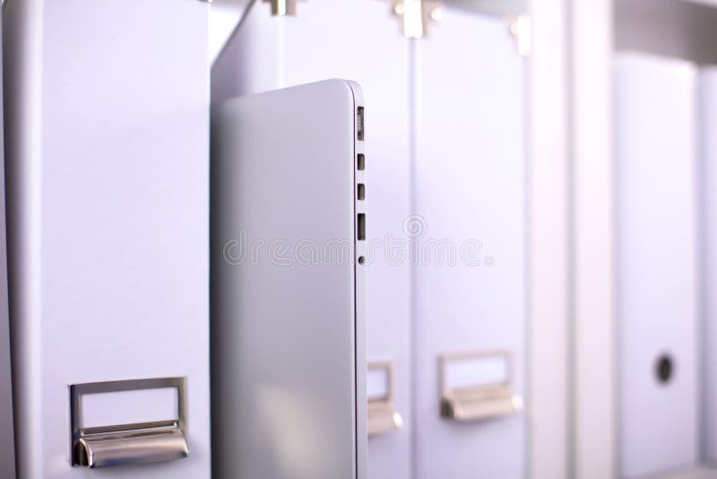 File Folders, Standing on Shelves in the Background Stock Photo - Image ...