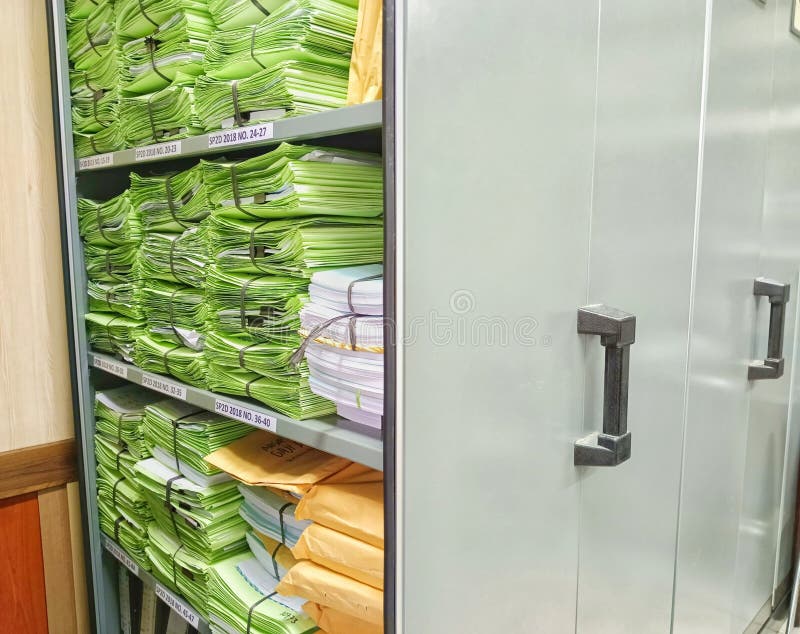 File Storage Shelves with Document Bundles in Office Stock Image ...