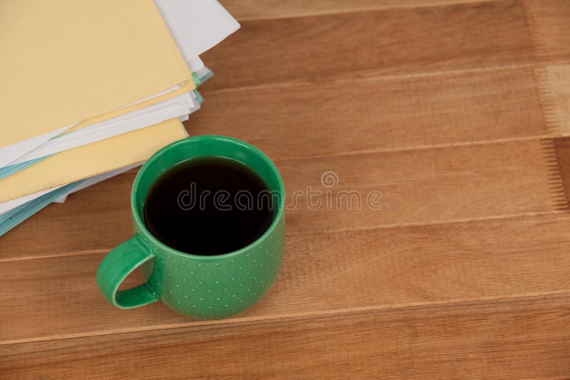 Files and Coffee Mug on Wooden Desk Stock Image - Image of paperwork ...