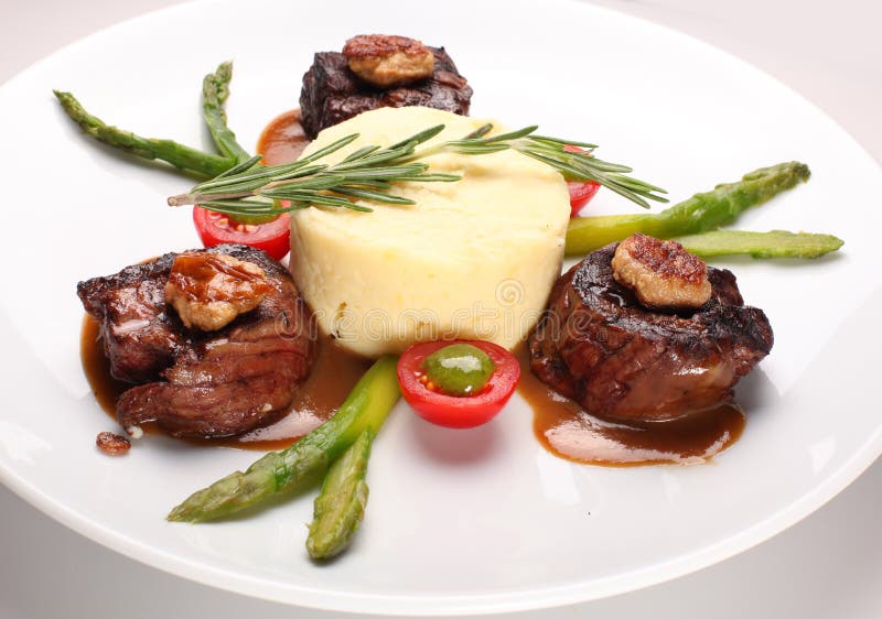 Filet Mignon with Asparagus and Mashed Potatoes on a White Plate Stock ...
