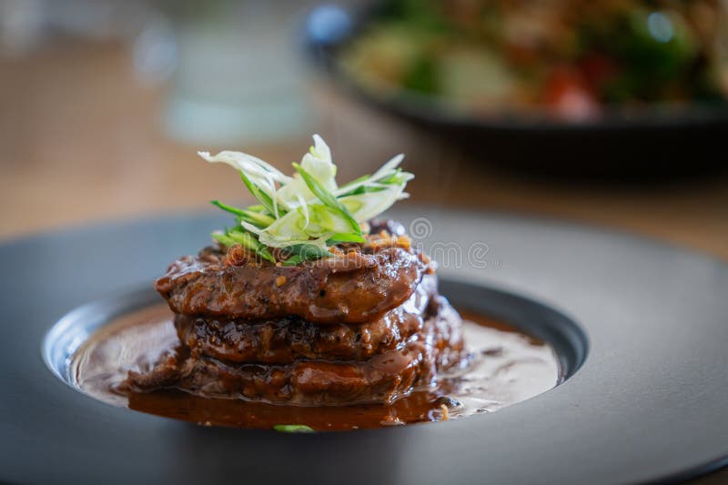 Filet Mignon, Grilled Beef Steak on a Plate with Sauce and Garnish ...
