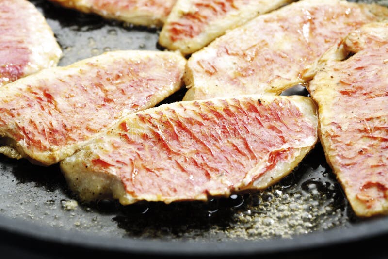 Filets of Sea Barbel in Pan, Close-up Stock Image - Image of sizzle ...