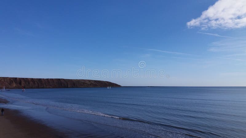Filey stock photo. Image of beach, brigg, cliffs, scene - 127903524
