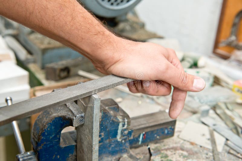 The Craftsman Filing the Work Piece Stock Photo - Image of movement ...
