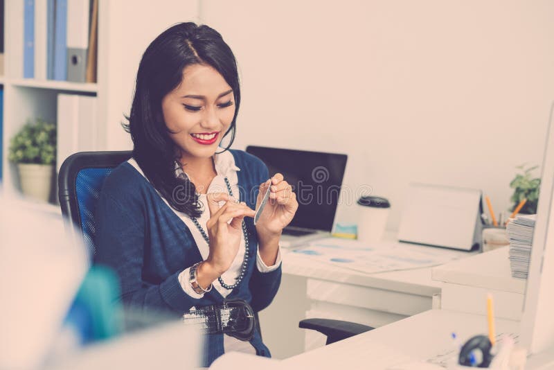 Filing nails stock photo. Image of leisure, feminine - 60087990